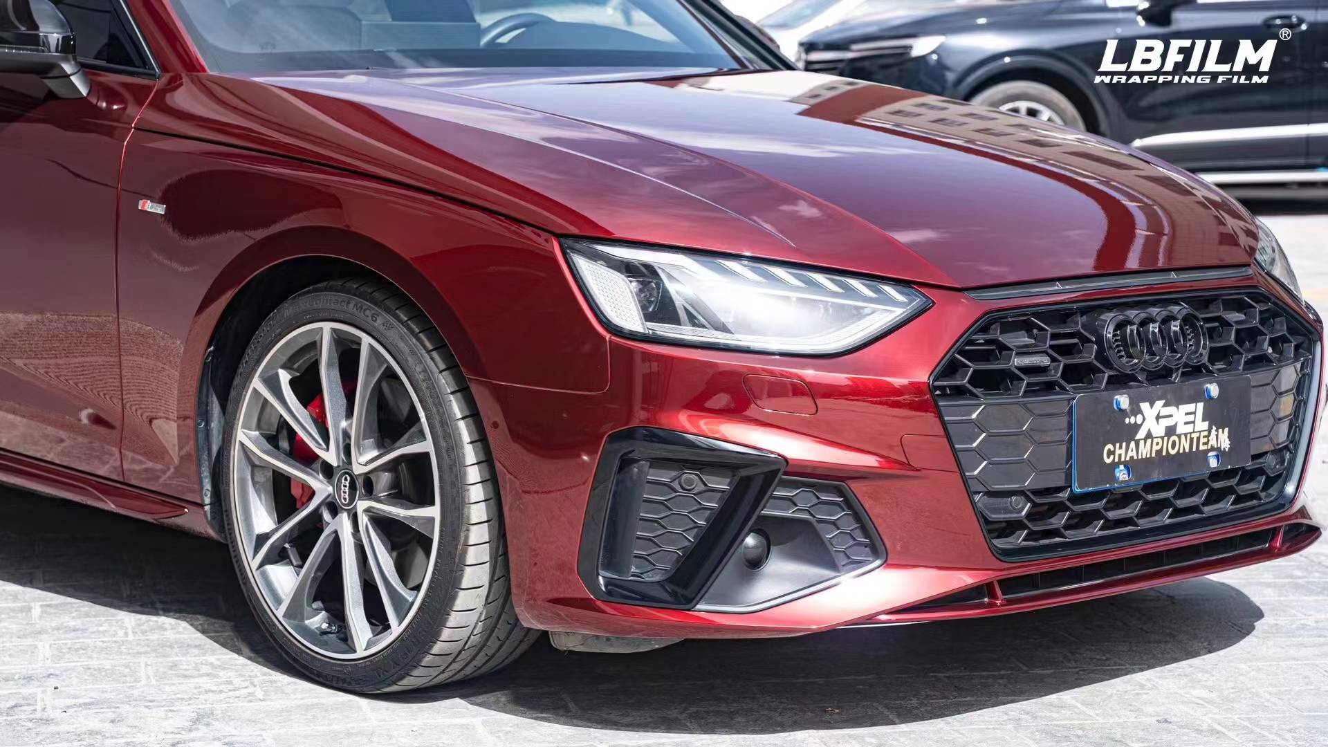 奥迪A4L-LB改色膜液态金属龙血红，高贵与华丽的结合_搜狐汽车_搜狐网