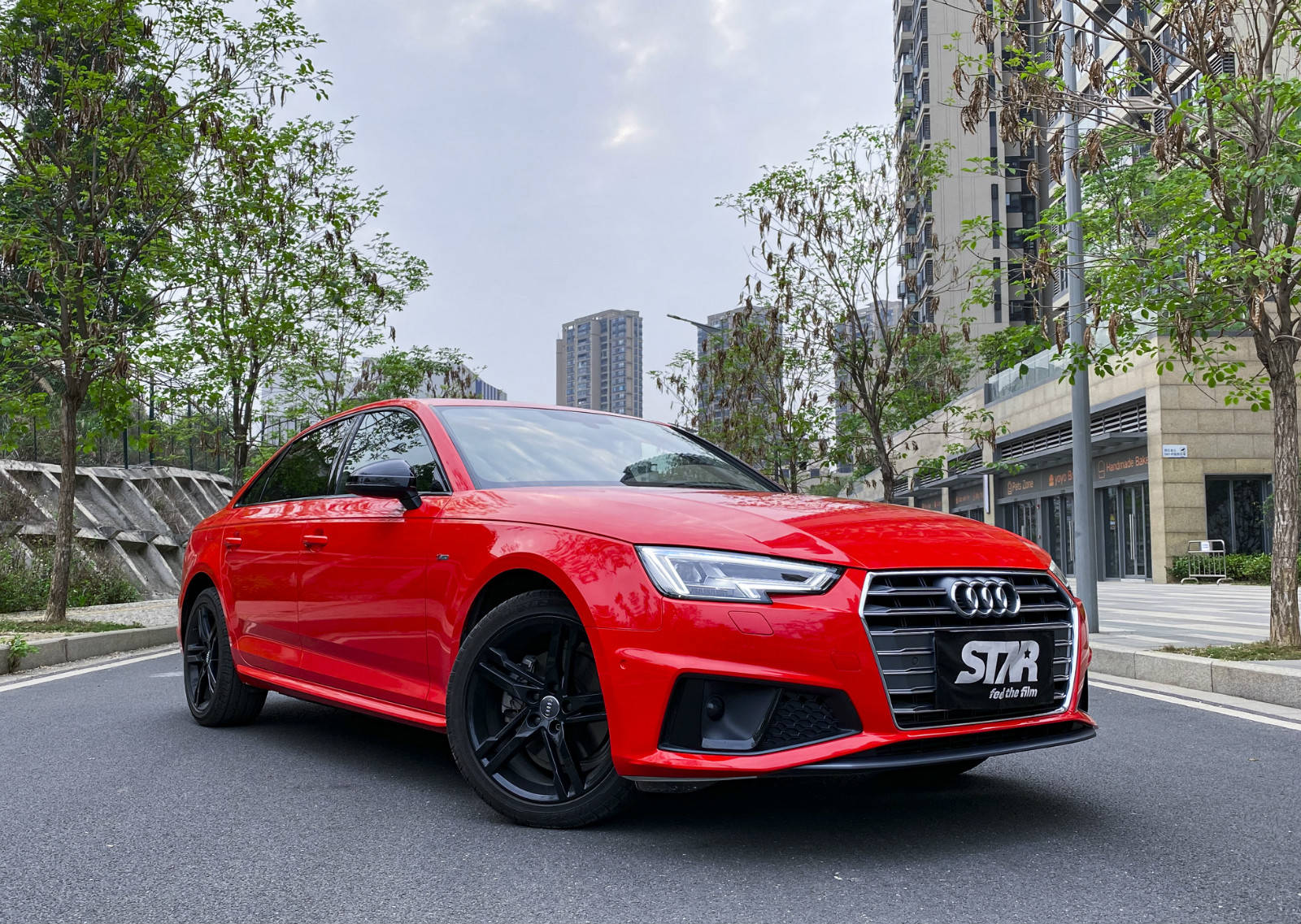 江苏汽车车身改色|STAR星魔改色膜奥迪A4L PET法拉利红案例展示_搜狐汽车_搜狐网